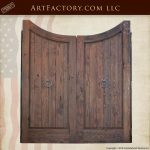 Inverted Arch Fortress Gates: Thick Solid Wood And Hand Forged Iron