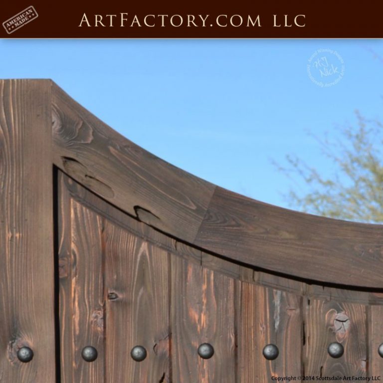 Inverted Arch Fortress Gates: Thick Solid Wood And Hand Forged Iron